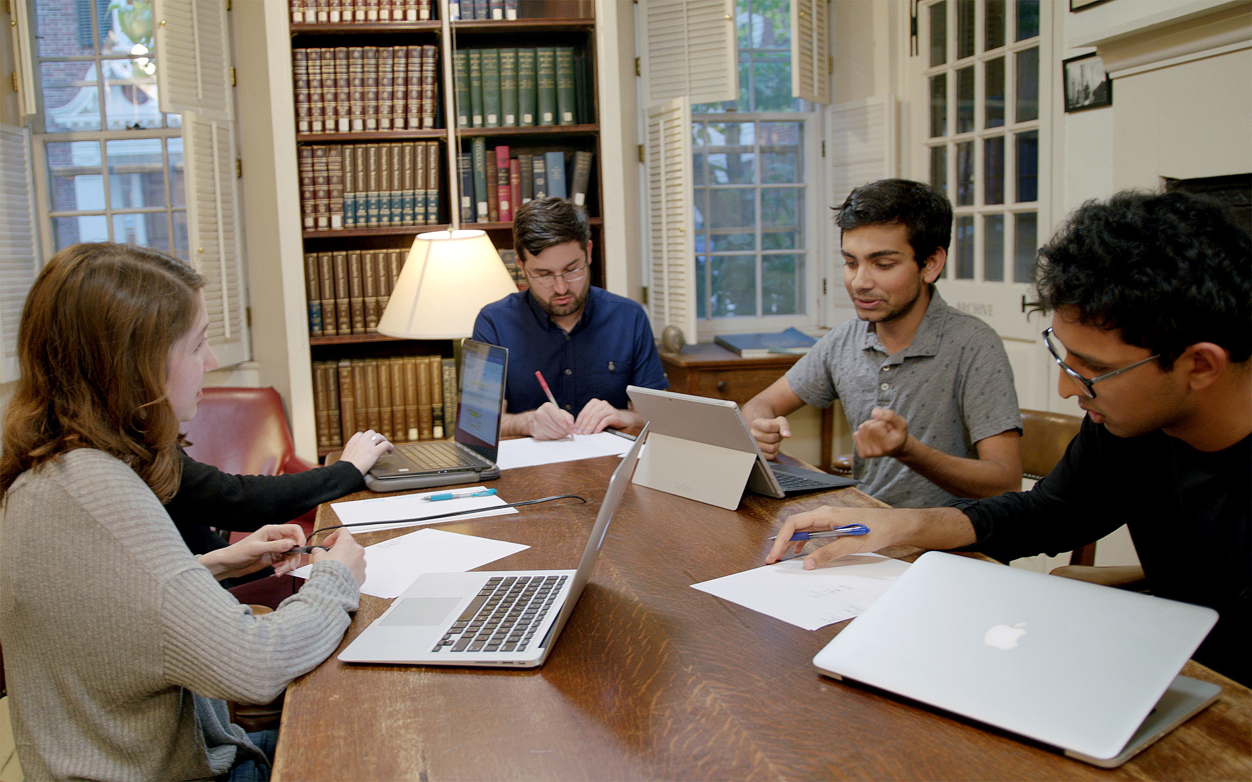 Debate team must research endlessly, analyze quickly, and talk smartly ...